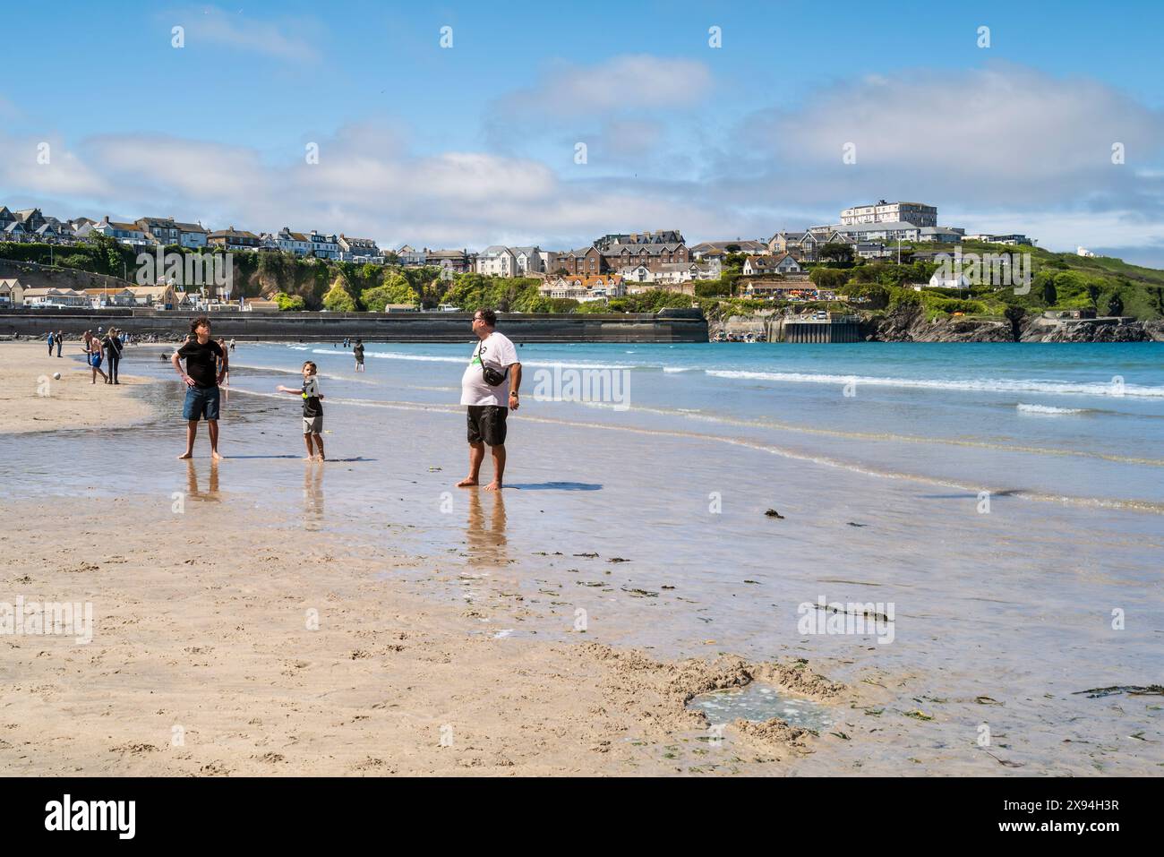 Holidaymakers relaxing on Towan Beach in Newquay in Cornwall in the UK ...