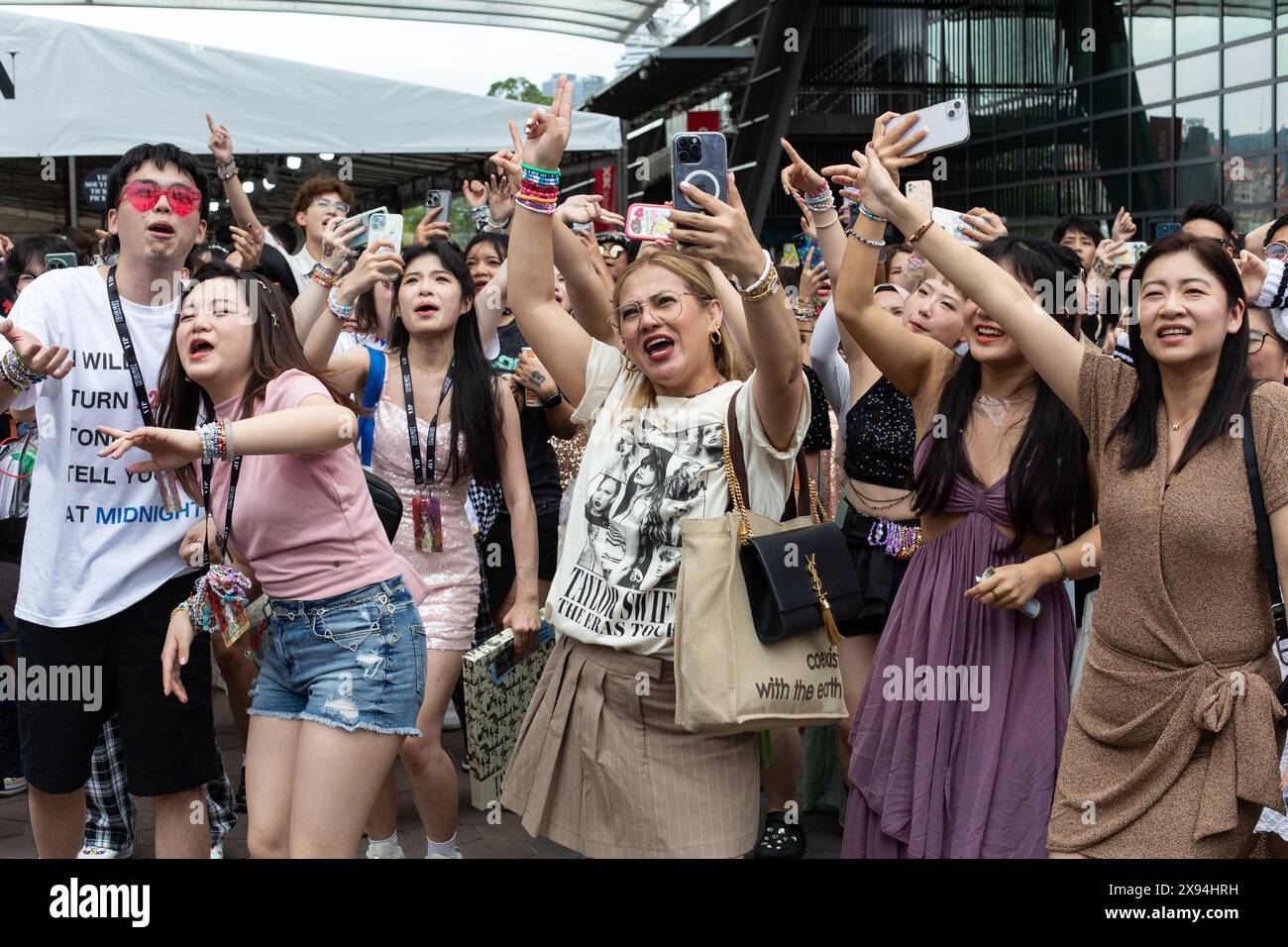 9th March 2024. Close up of fans singing and waving hands together at ...