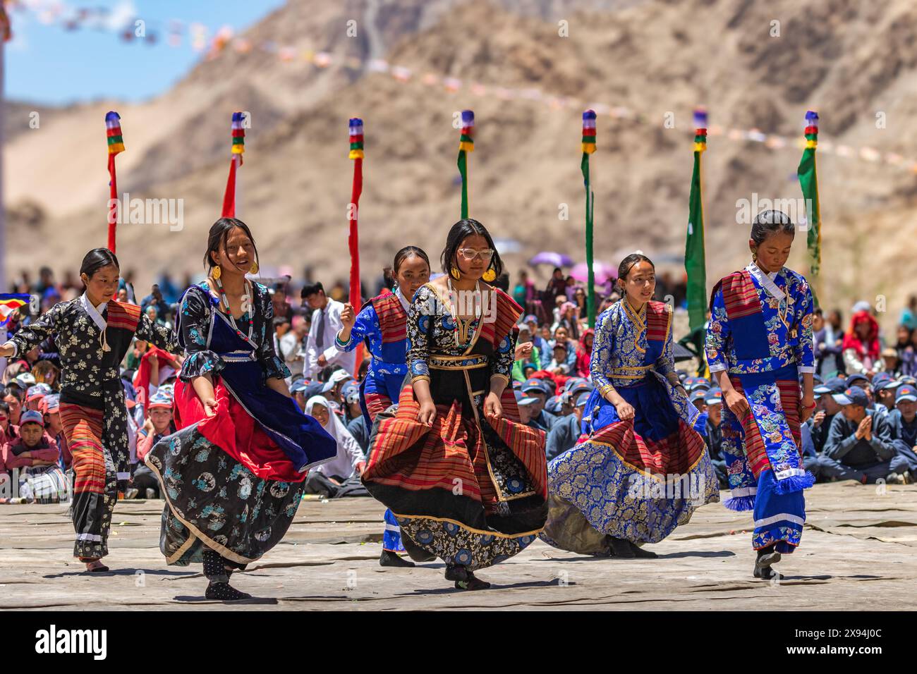 A group of young Nepali girls performing traditional dance sequence ...