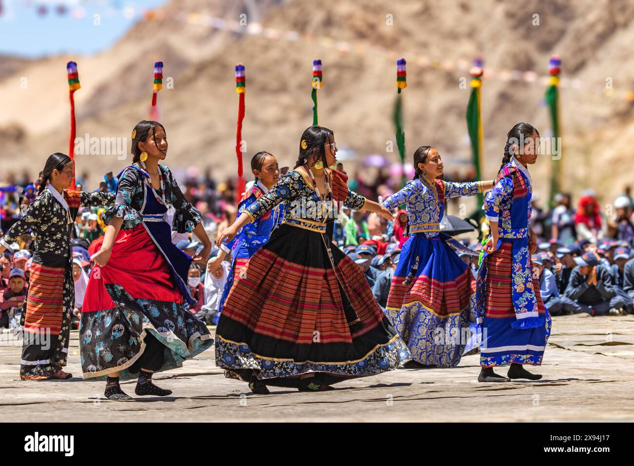 A group of young Nepali girls performing traditional dance sequence ...