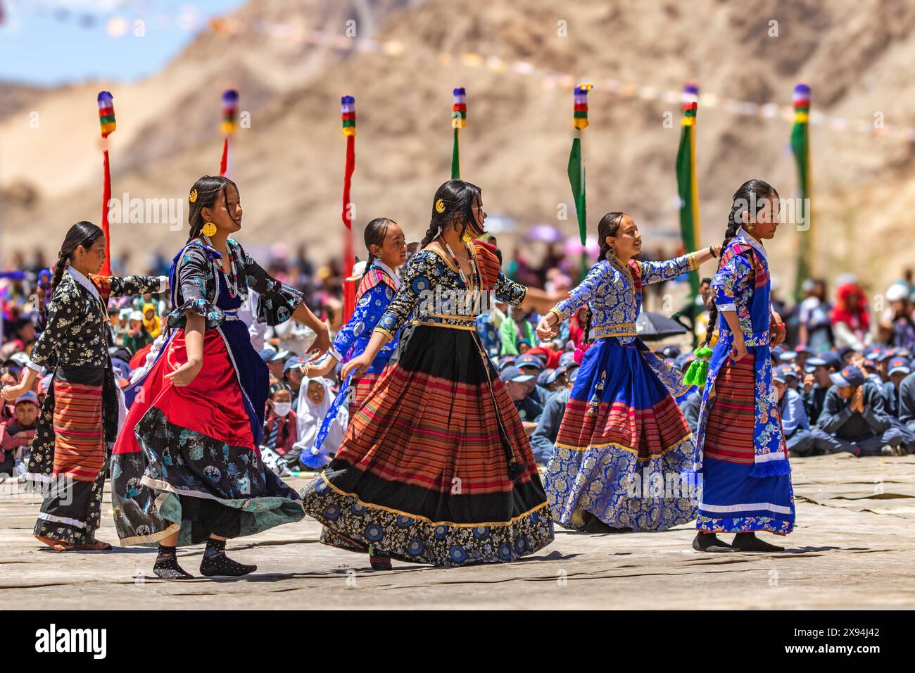 A group of young Nepali girls performing traditional dance sequence ...