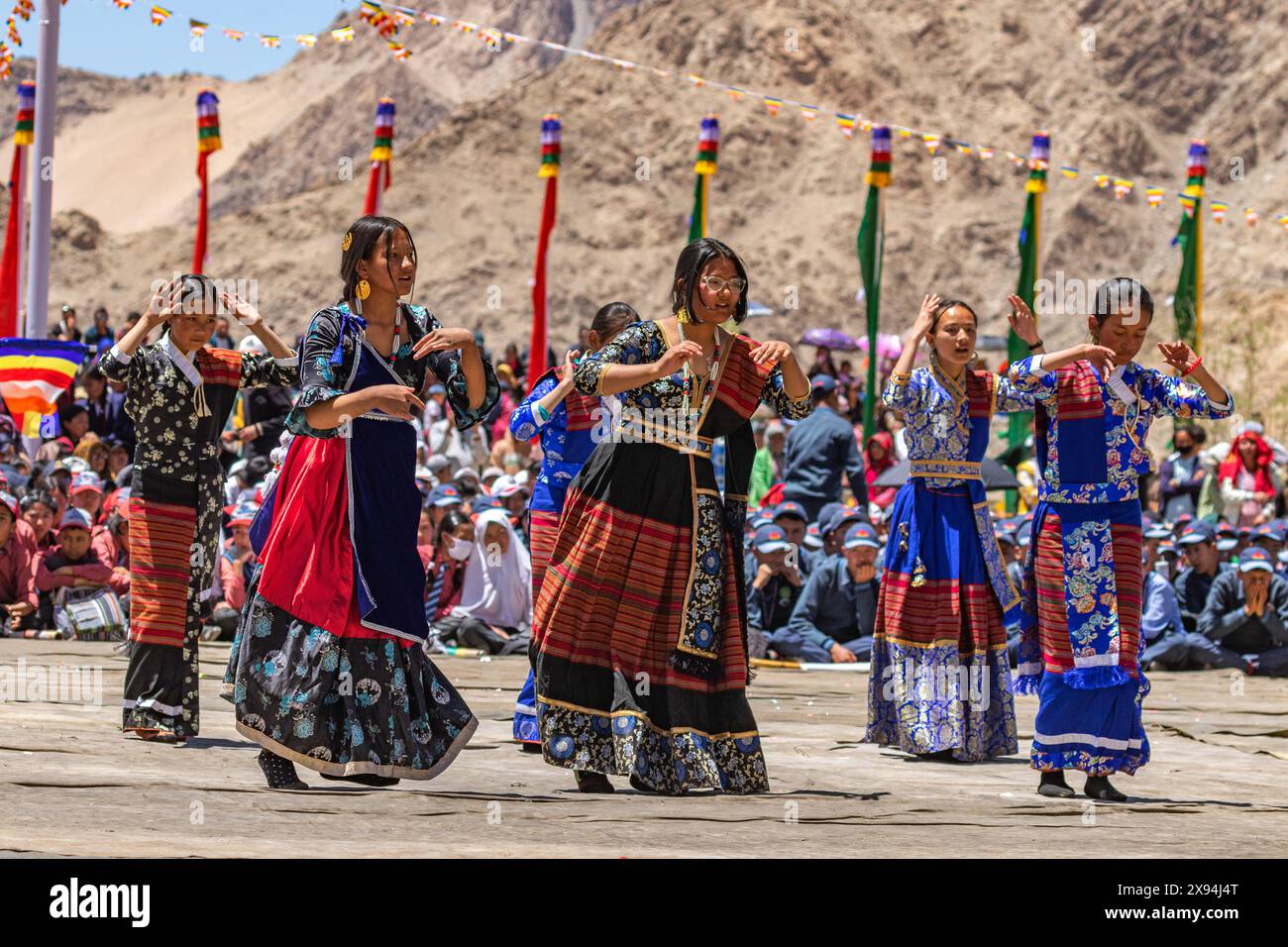 A group of young Nepali girls performing traditional dance sequence ...