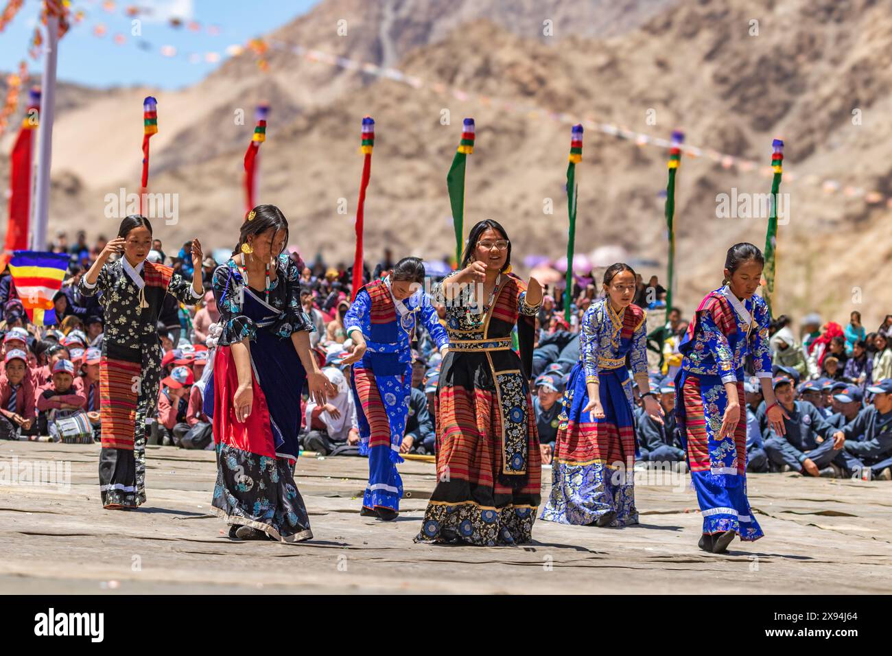 A group of young Nepali girls performing traditional dance sequence ...