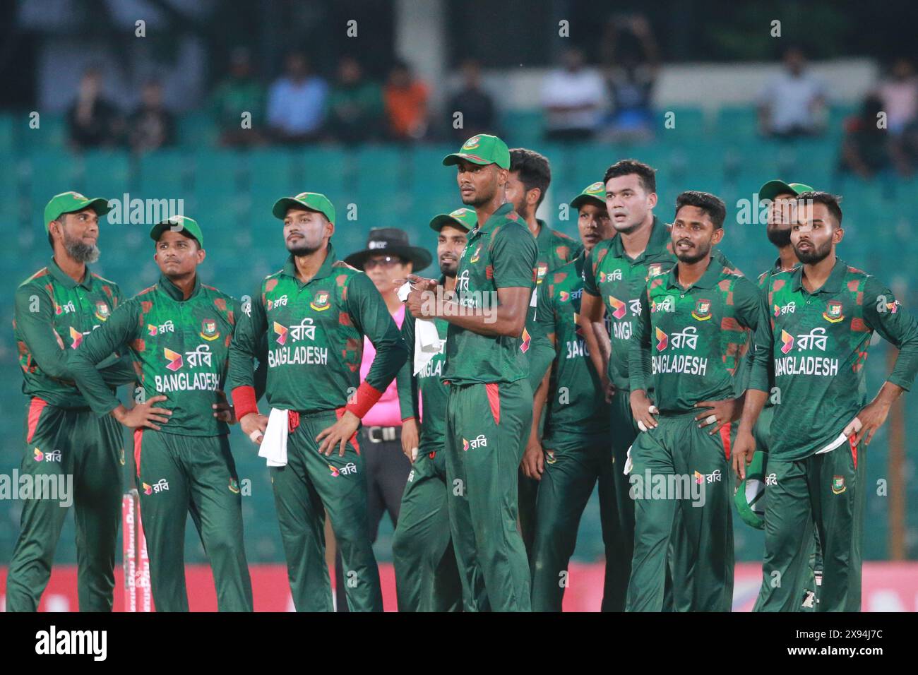 Bangladeshi players look on screen for third umpire decesion during the ...