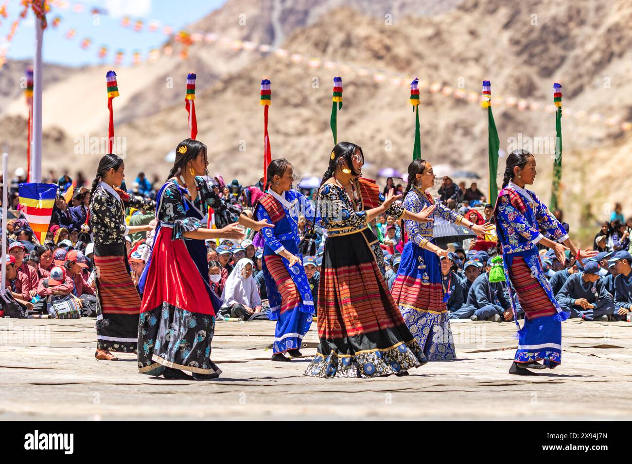A group of young Nepali girls performing traditional dance sequence ...