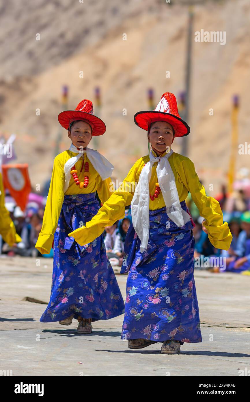 Young girls from Ladakh performing a dance wearing their traditional ...