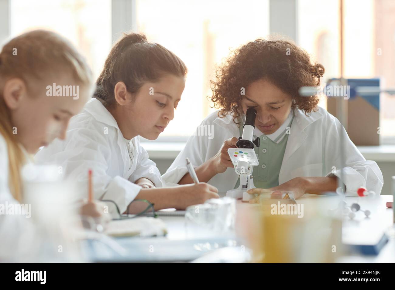 Selective focus shot of ethnically diverse middle school students ...