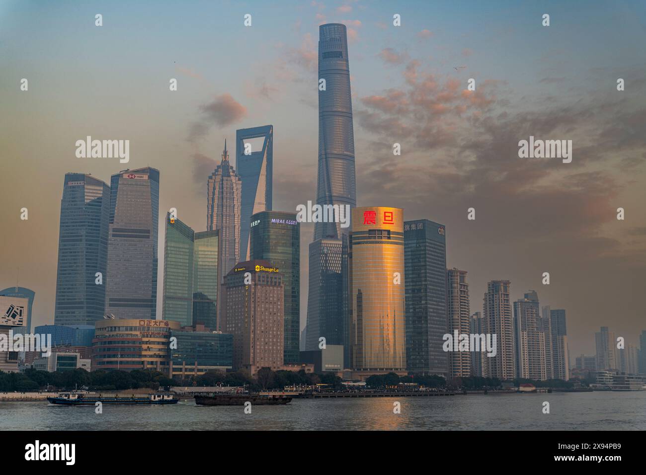 Pudong seen from the Bund, waterfront area, Central Shanghai at sunset ...
