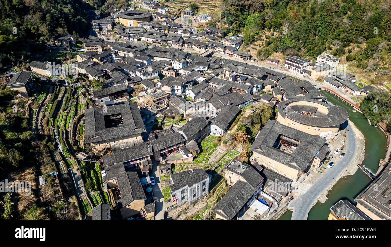 Aerial of Taxia village and Fujian Tulou, rural dwelling of the Hakka ...