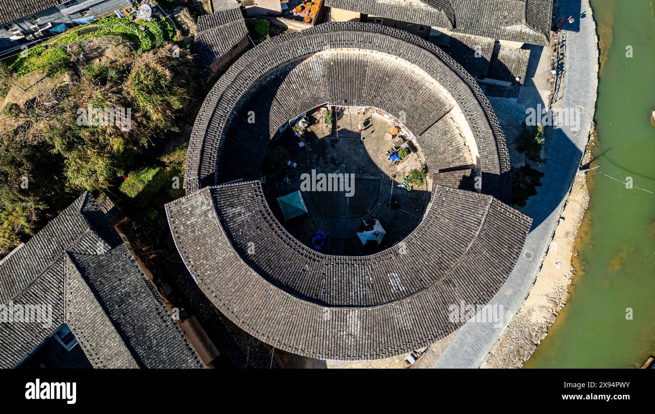 Aerial of Taxia village and Fujian Tulou, rural dwelling of the Hakka ...