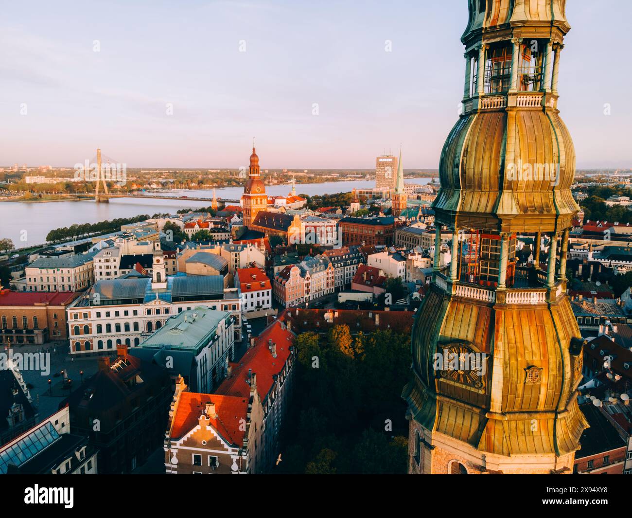 Aerial drone sunrise view of St. Peter's Church in Riga Old Town ...