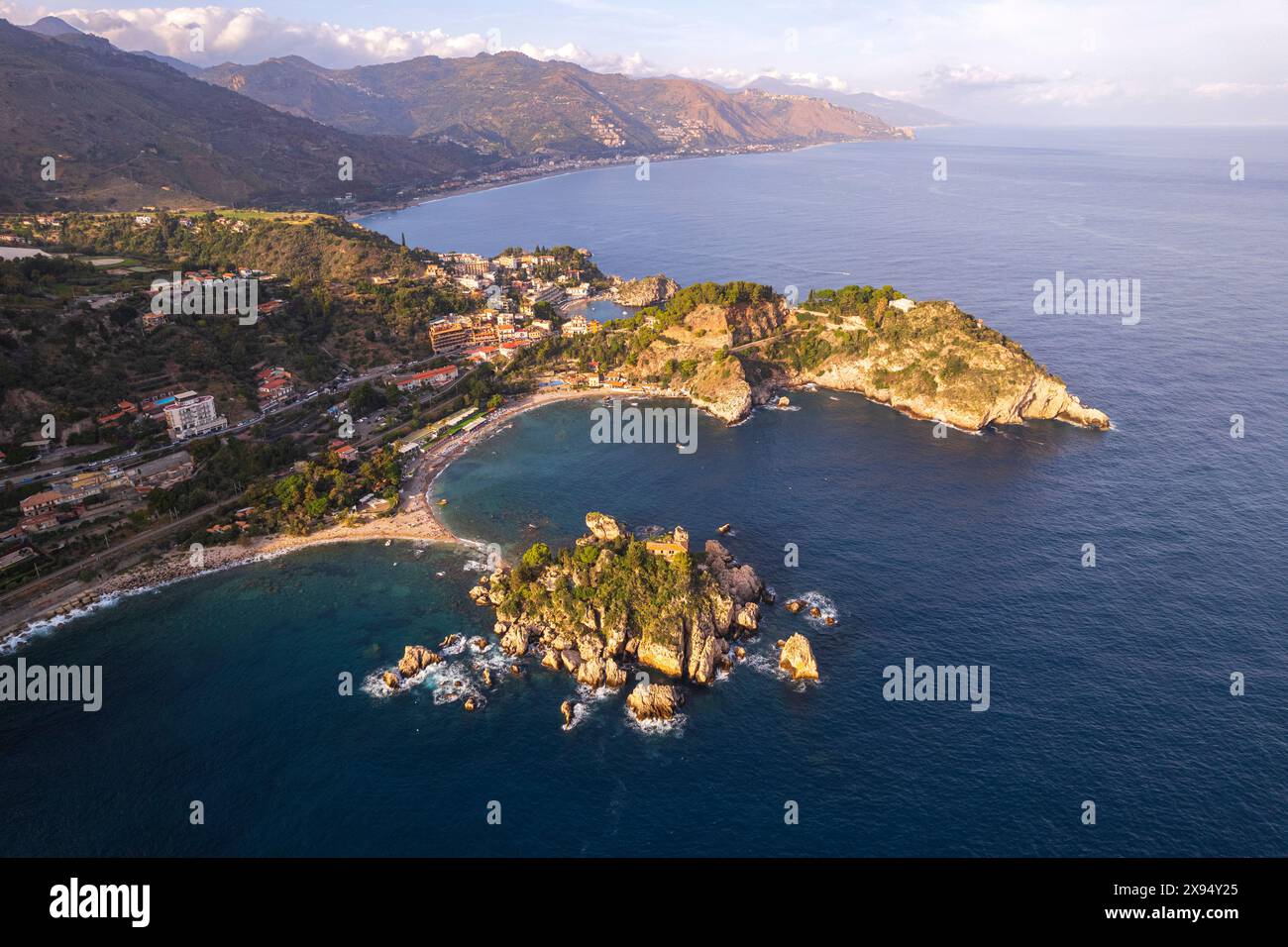 Aerial view of the Sicilian rocky shoreline of Taormina municipality ...