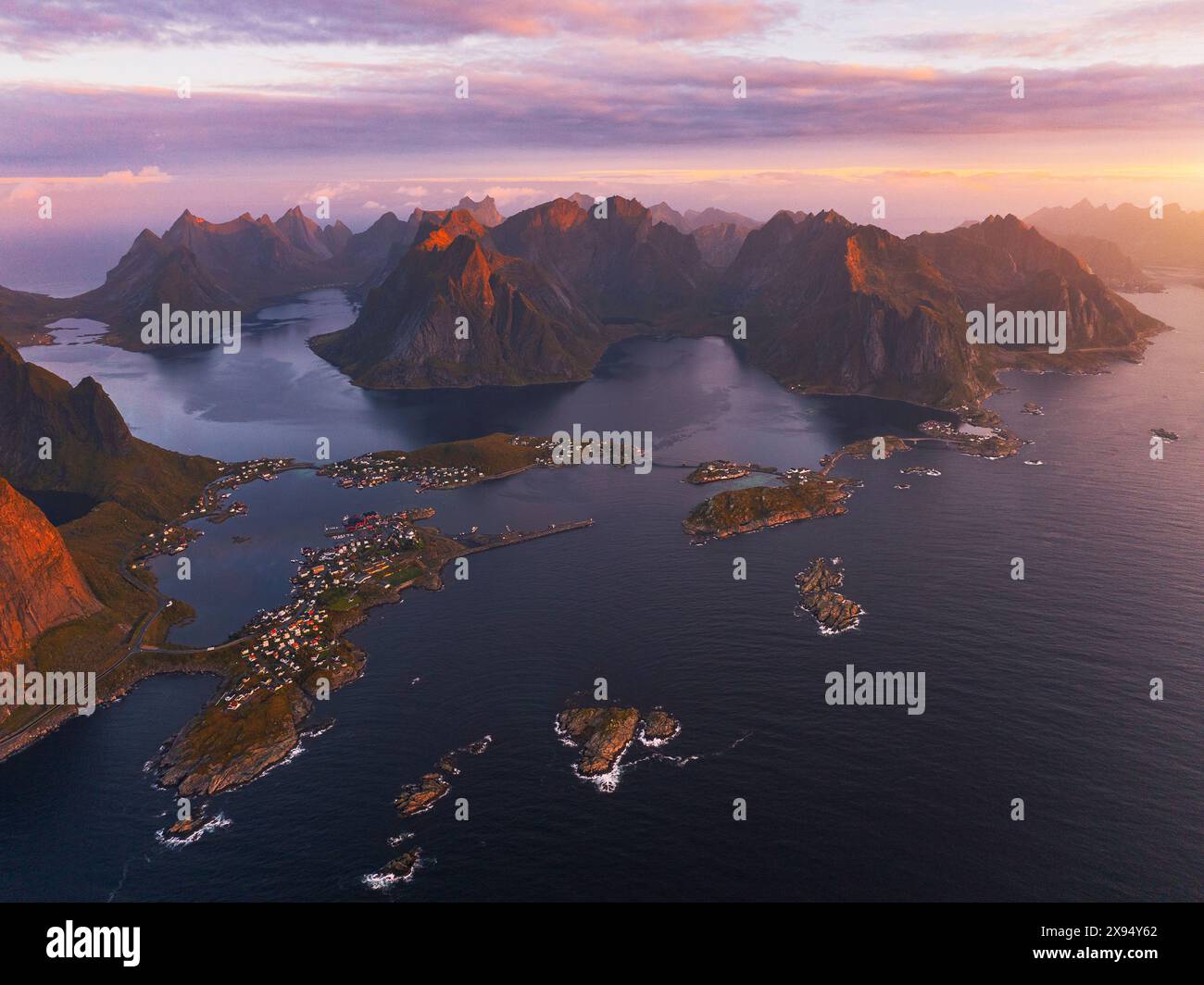 Amazing aerial view taken by drone of the Reine fjord during a sunrise ...