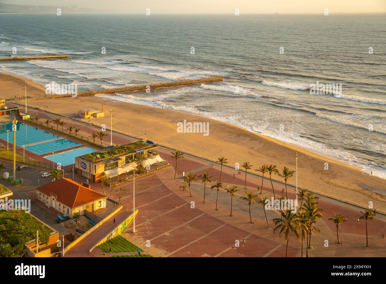 Elevated view of beaches, promenade and Indian Ocean at sunrise, Durban ...
