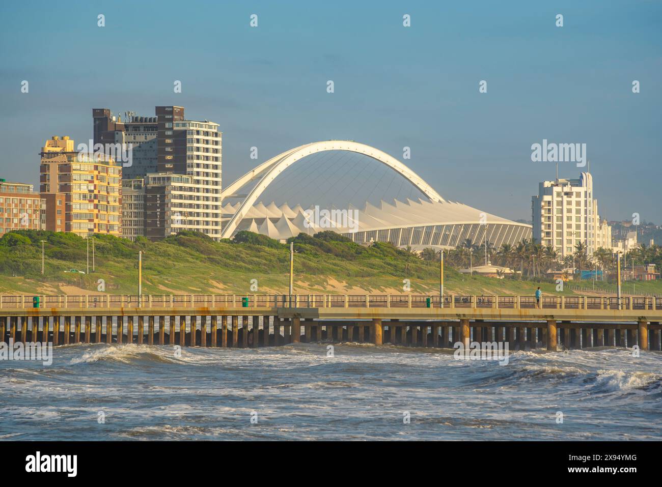 View of Moses Mabhida Stadium from pier in Indian Ocean, Durban ...