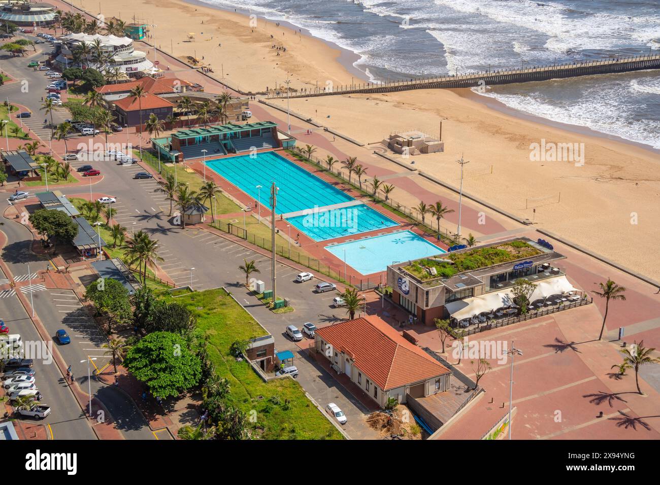 Elevated view of outdoor swimming pool on promenade, Durban, KwaZulu ...