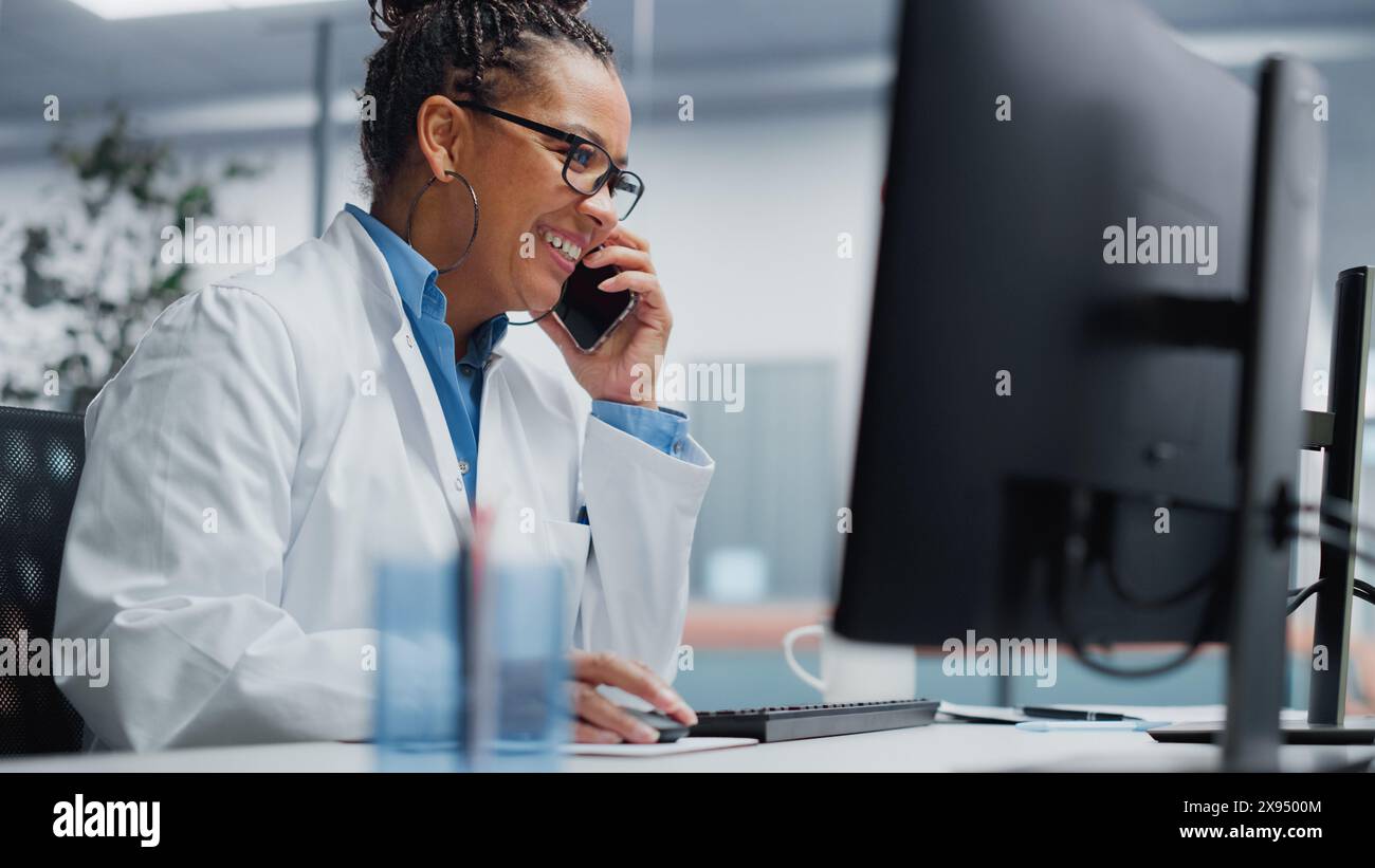 Medical Hospital Research Lab: Black Female Neurosurgeon Using Computer ...