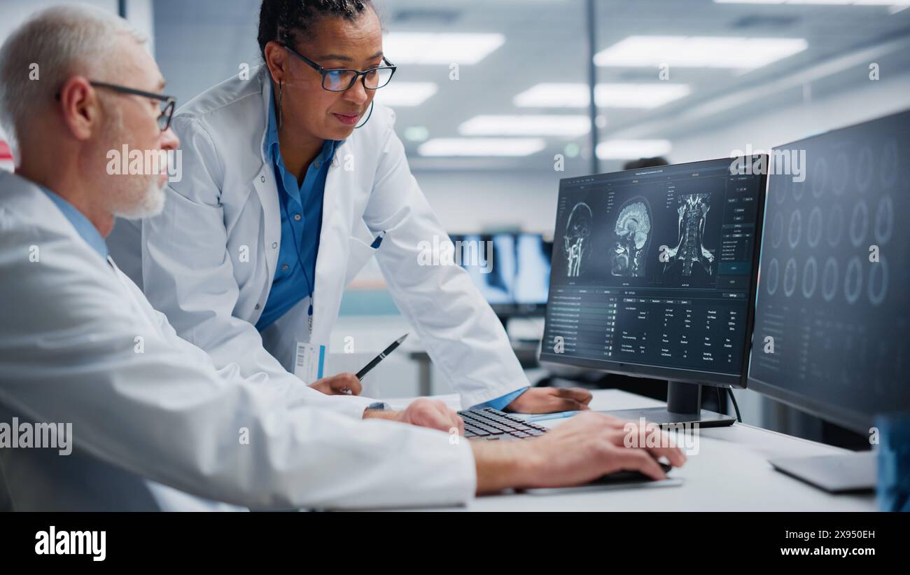 Medical Hospital: Happy Neurologist and Neurosurgeon Talk, Use Computer ...