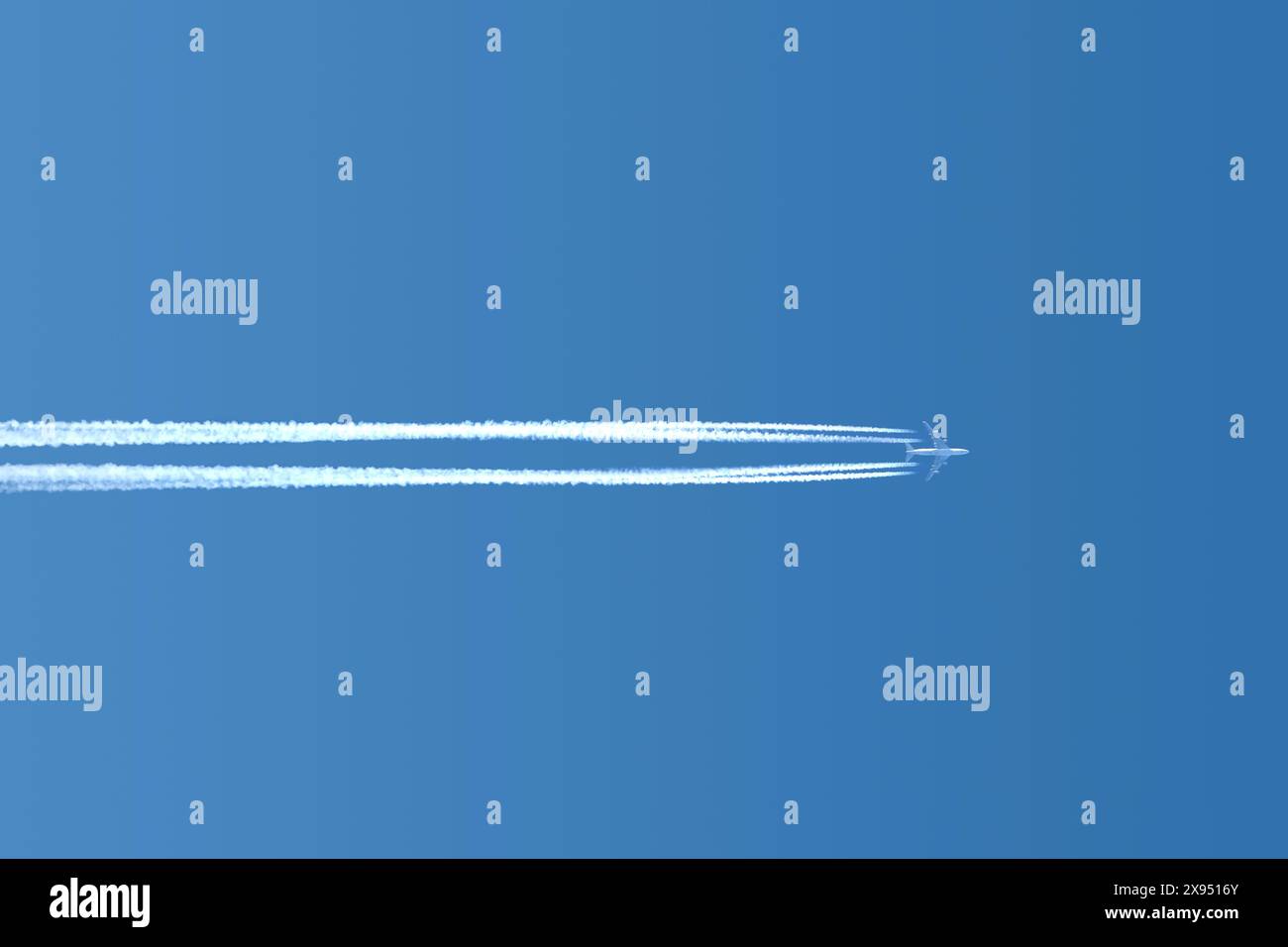 Large four motors passenger supersonic airplane flying horizontally ...