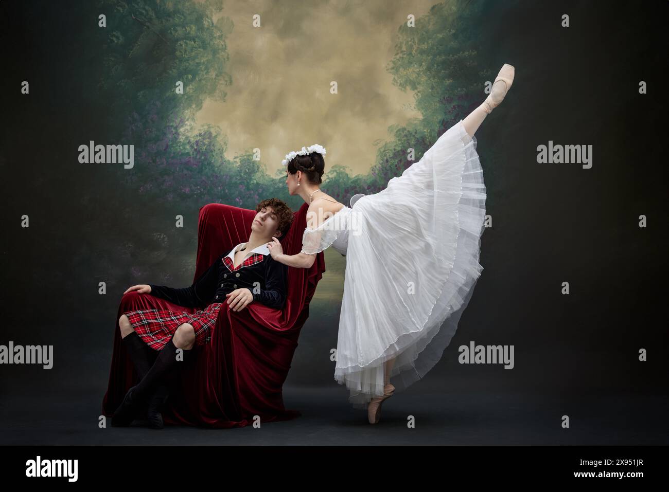 Young ballerina softly interacted with her sleeping in chair partner ...