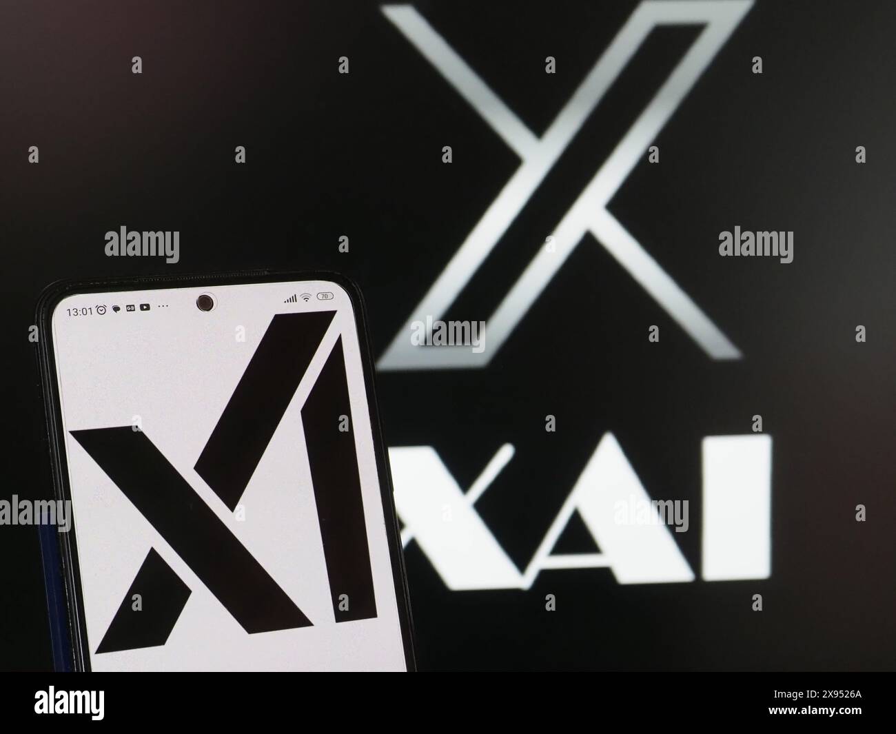 In this photo illustration, a xAI Corp. logo seen displayed on a ...