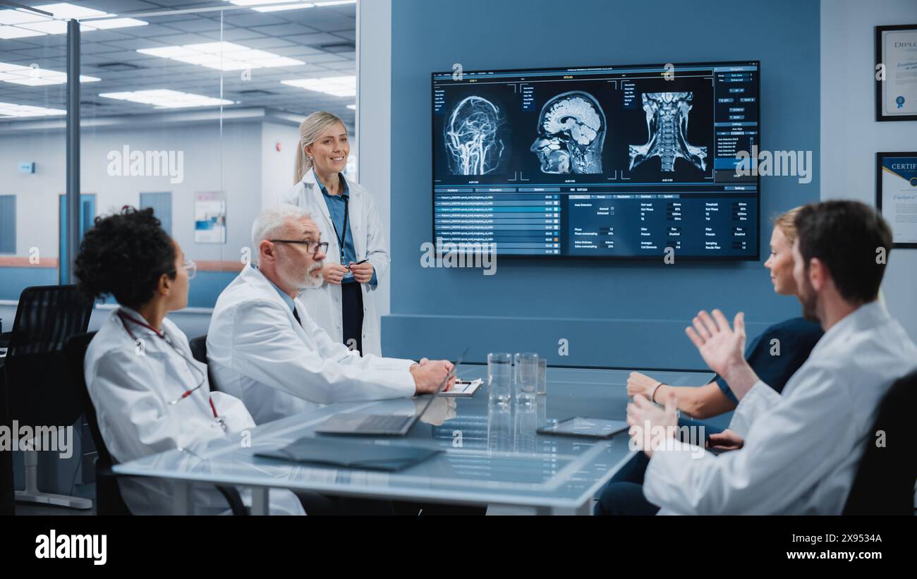 Hospital Conference Meeting Room: Neurologist Shows MRI scan, Magnetic ...