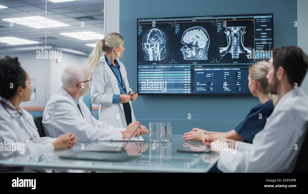 Hospital Conference Meeting Room: Female Neurologist Shows MRI Scan ...
