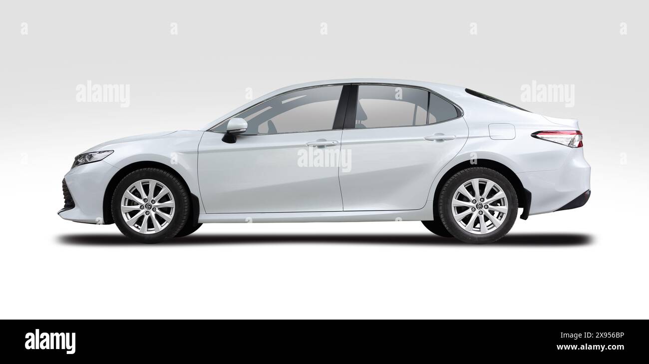 Toyota Camry car side view isolated on white background Stock Photo - Alamy