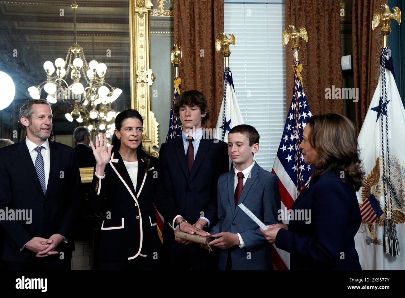 United States Vice President Kamala Harris, right, swears in Courtney O ...
