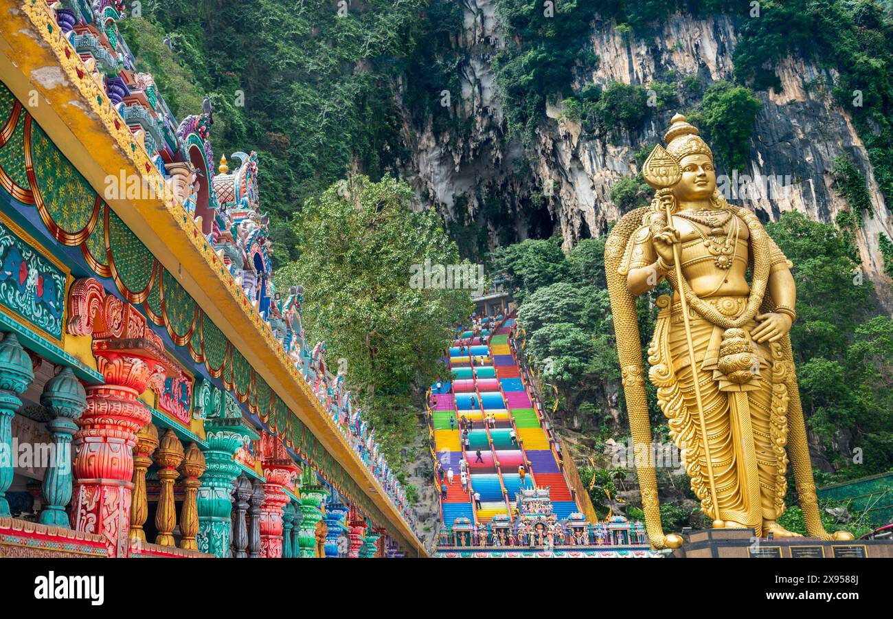 Kuala Lumpur, Malaysia-April 17 2023:Visitors climb the colorful stairs ...