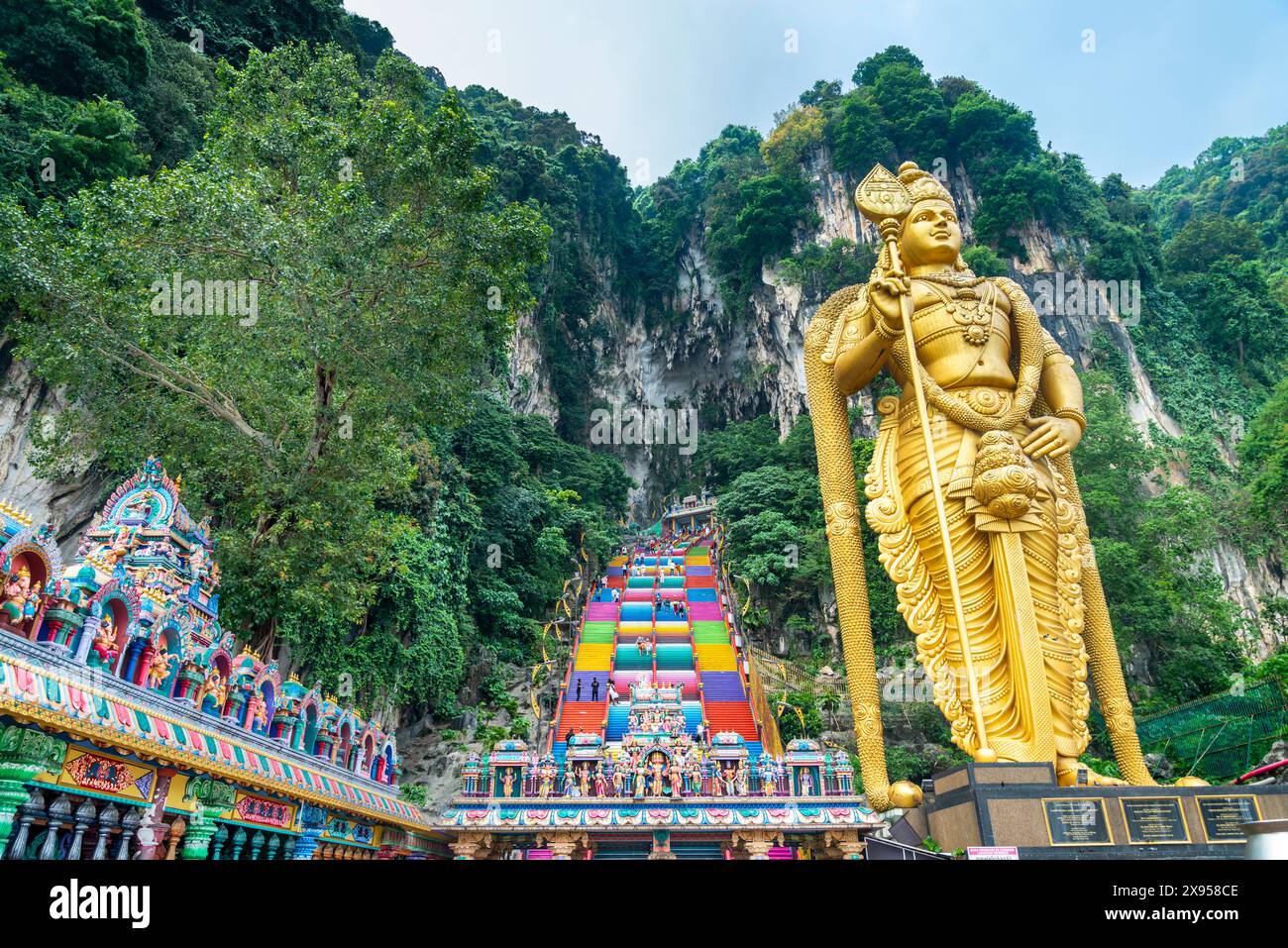 Kuala Lumpur, Malaysia-April 17 2023:Visitors climb the colorful stairs ...