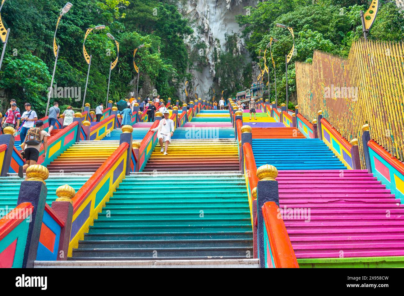 Kuala Lumpur, Malaysia-April 17 2023:Visitors climb the multi-colored ...