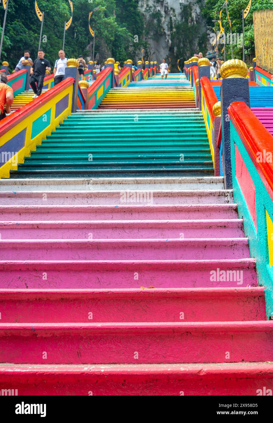 Kuala Lumpur, Malaysia-April 17 2023:Visitors climb the multi-colored ...