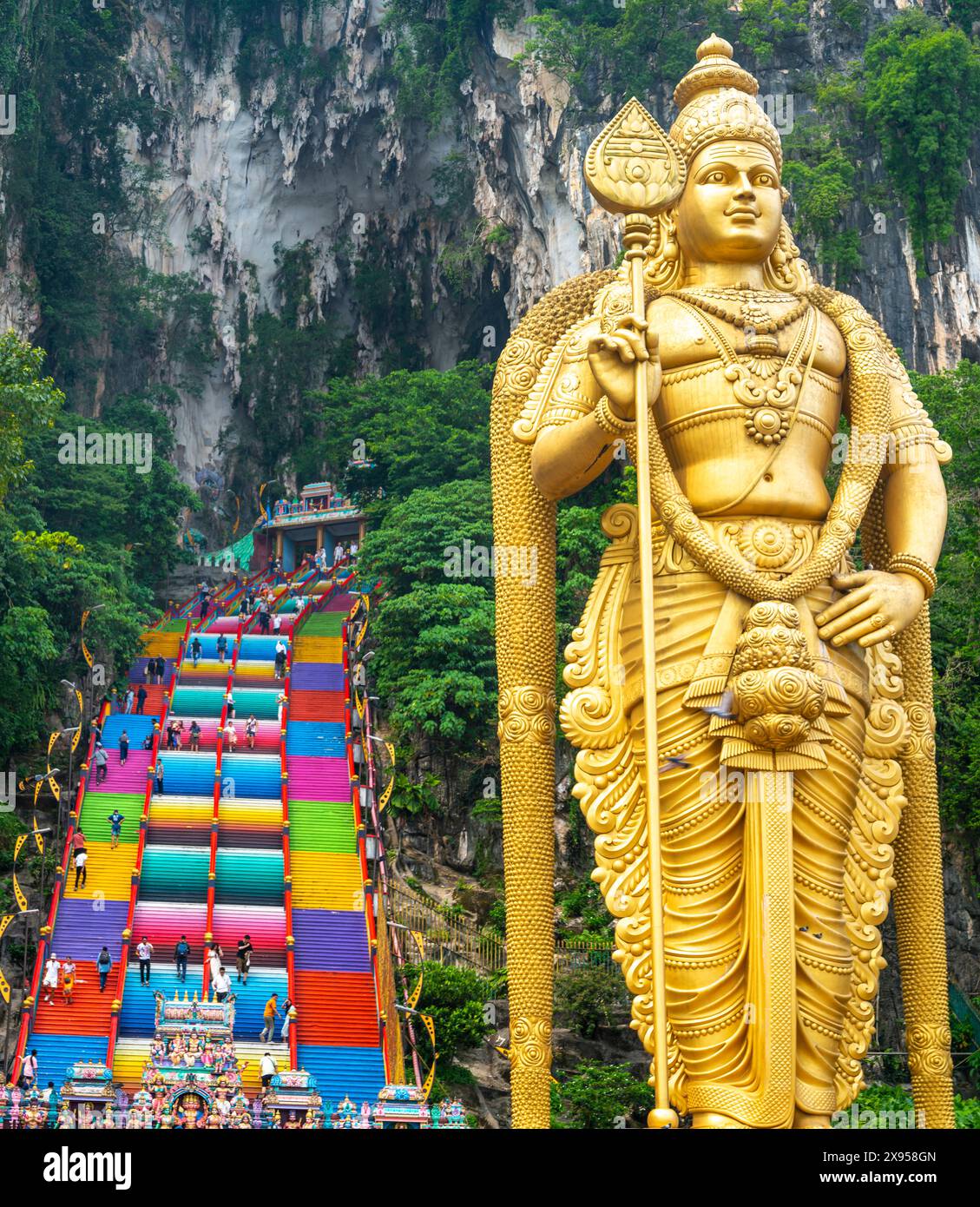 Kuala Lumpur, Malaysia-April 17 2023:Visitors climb the colorful stairs ...