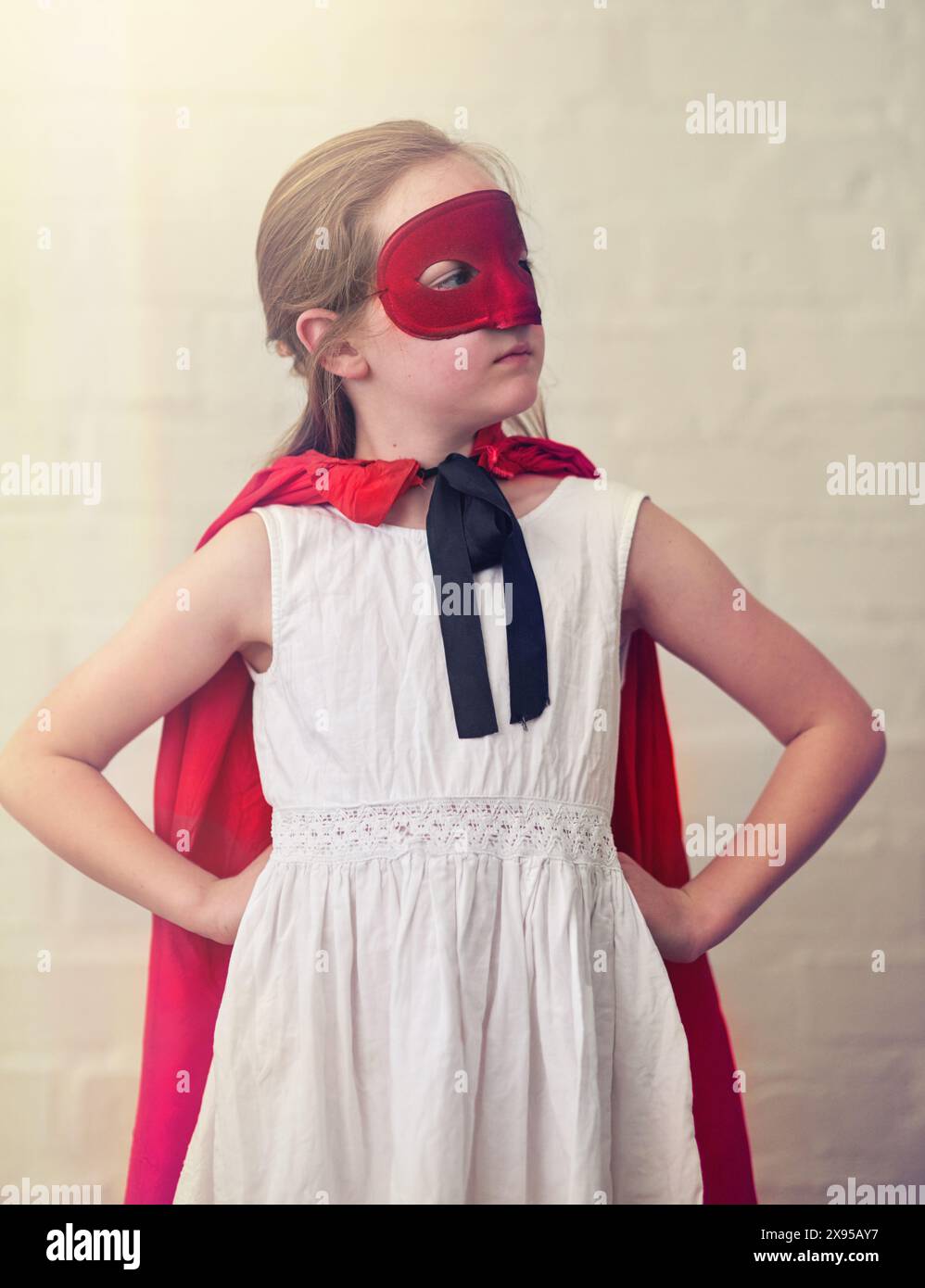 Children, pose and girl with superhero costume on wall background for ...