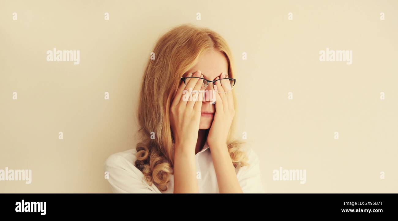 Tired overworked woman employee rubbing her eyes suffering from eye ...