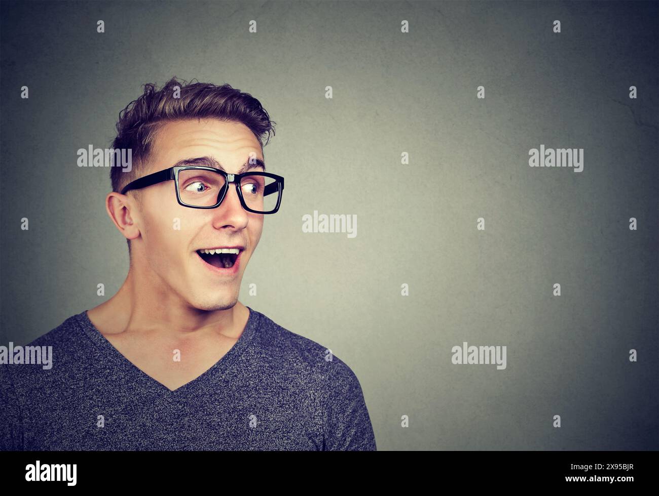 Amazed man listens carefully to a new rumor Stock Photo - Alamy