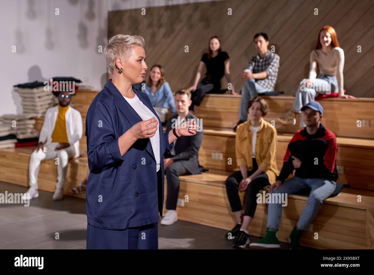 Side View On Confident Female Speaker Holding Conference Lecture For ...