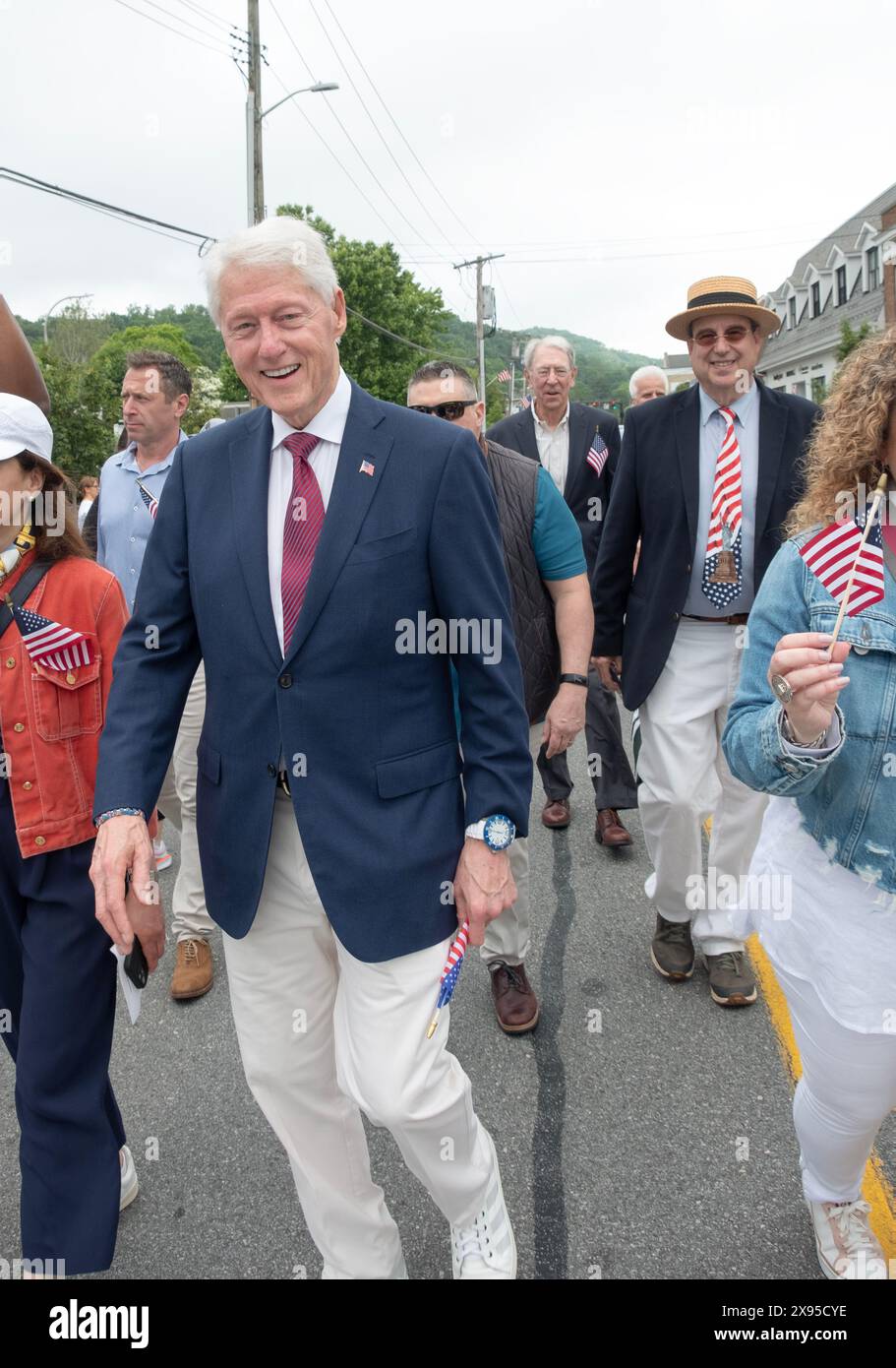 Former President Bill Clinton marching in the 2024 Memorial Day Parade ...