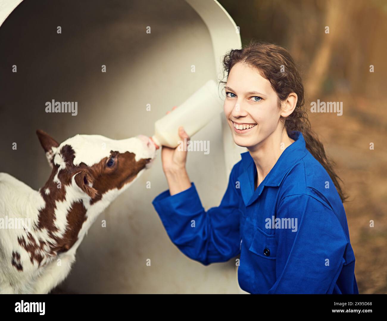 Portrait, woman and milk in bottle for calf, feeding and smile for baby ...