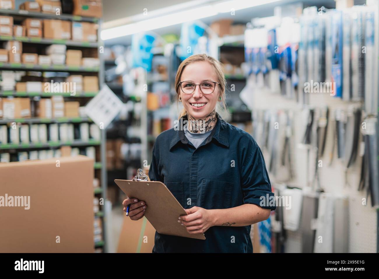 merchandiser checking products availibility for car repair Stock Photo ...