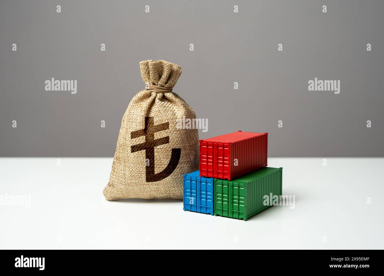 Stack of shipping containers and turkish lira money bag. Import or ...