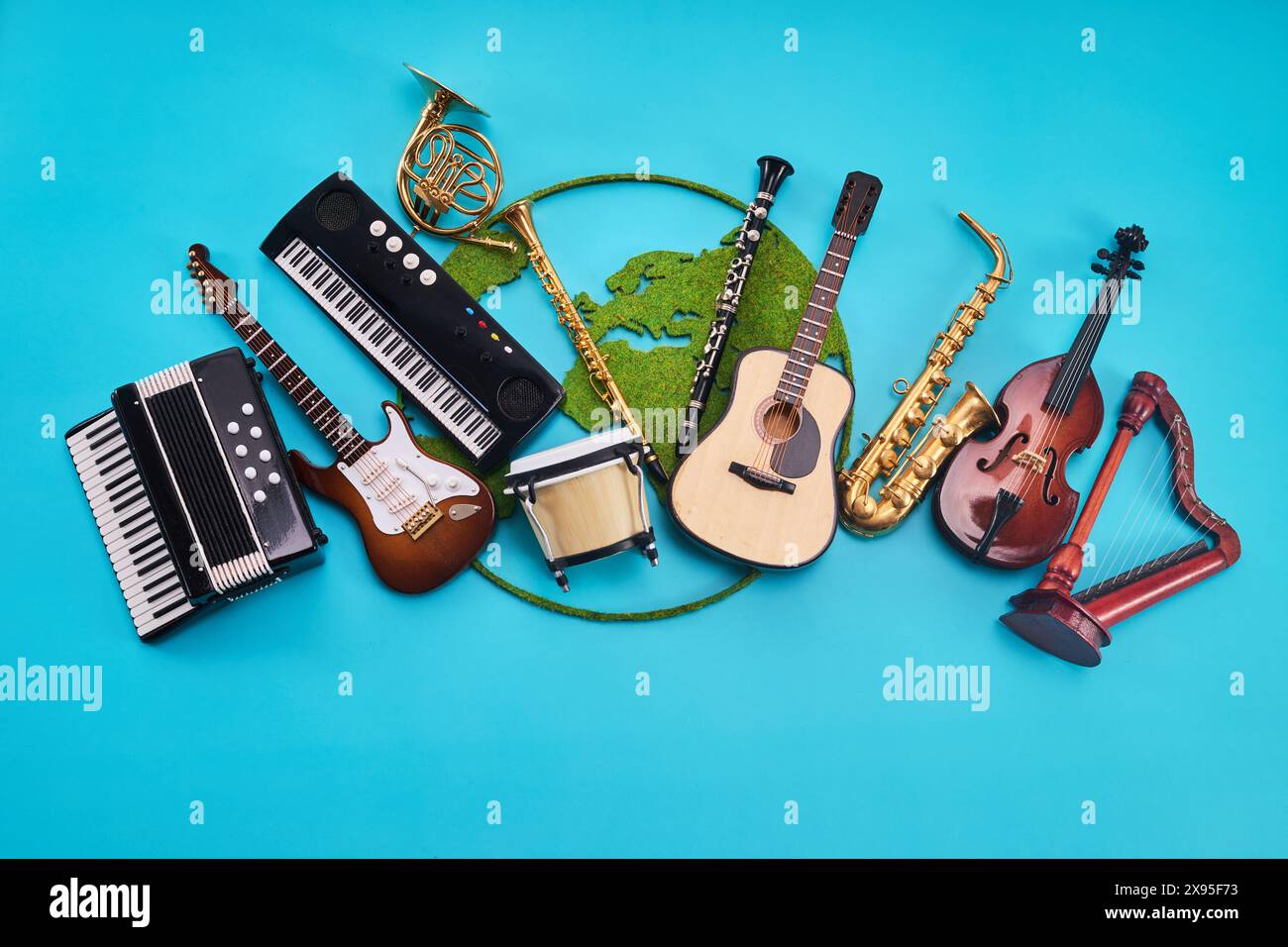 World Music Day. Assortment of Musical Instruments with world map on Blue background Stock Photo ...