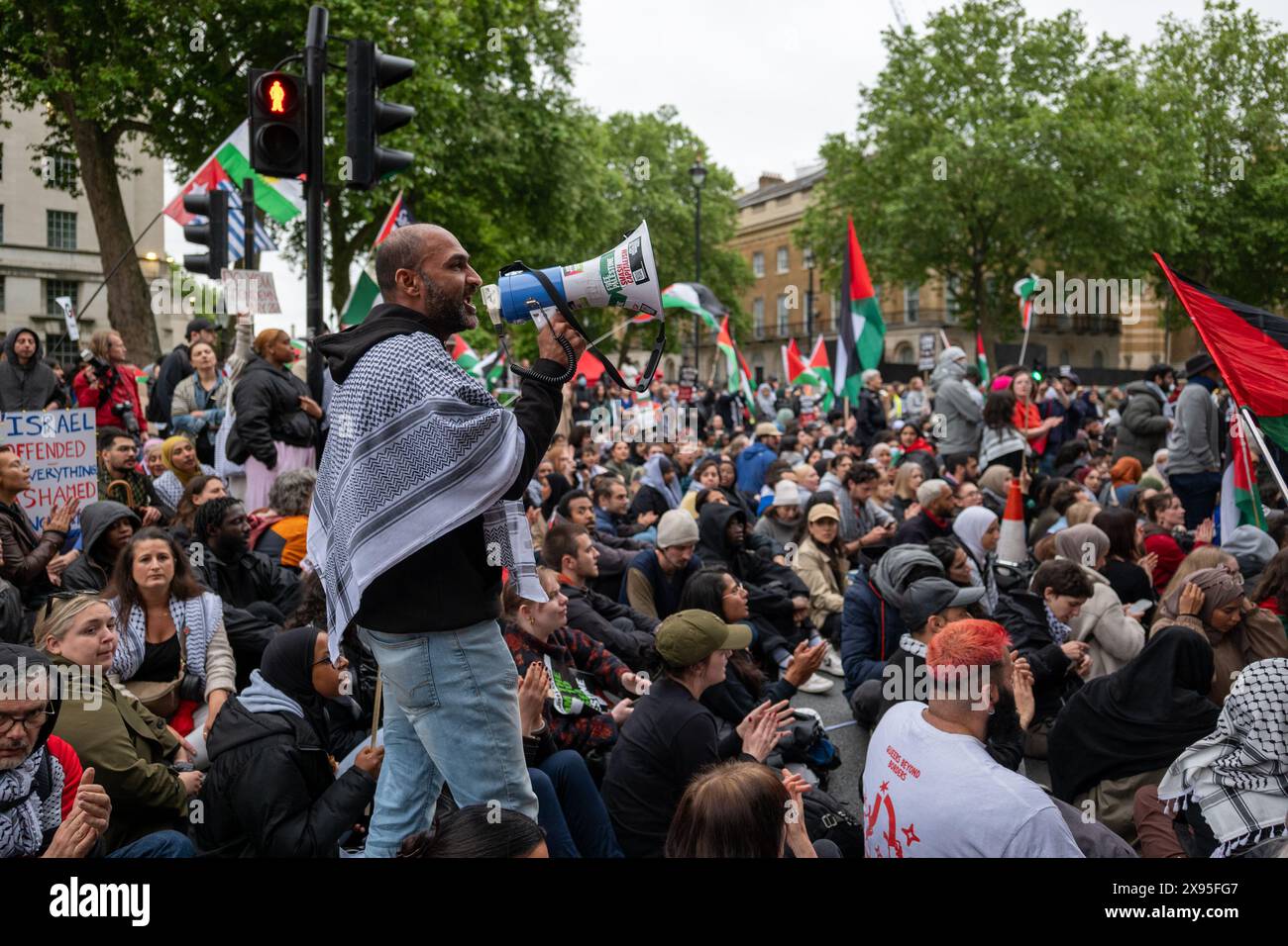 A emergency rally was called on Whitehall in central London, after the ...