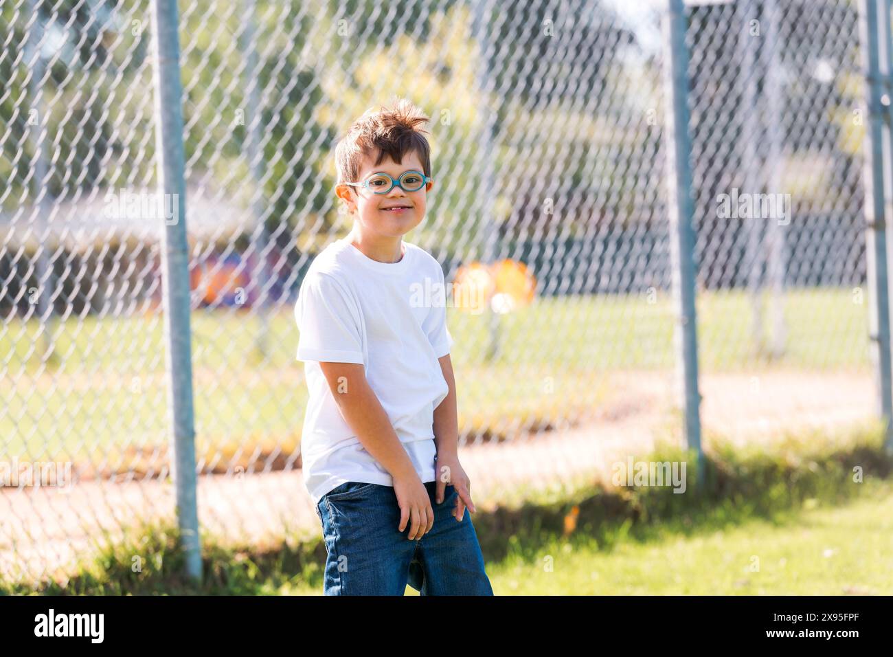 child boy posing on the school playground Stock Photo - Alamy