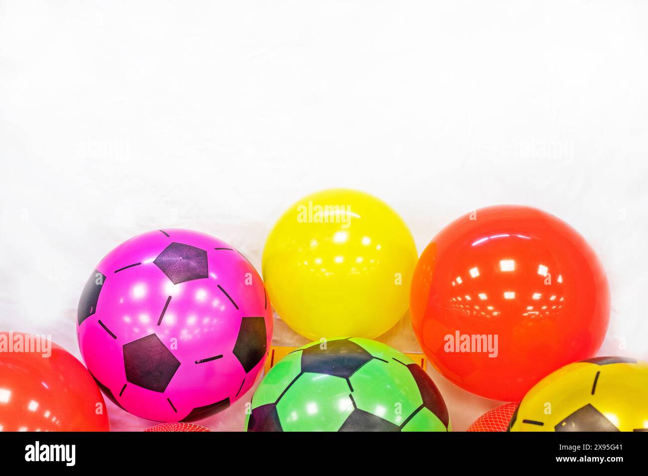 rubber inflatable children's balls on a light background. children's ...