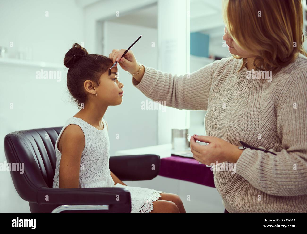 Backstage, celebrity or makeup with girl and stylist in studio, getting ...