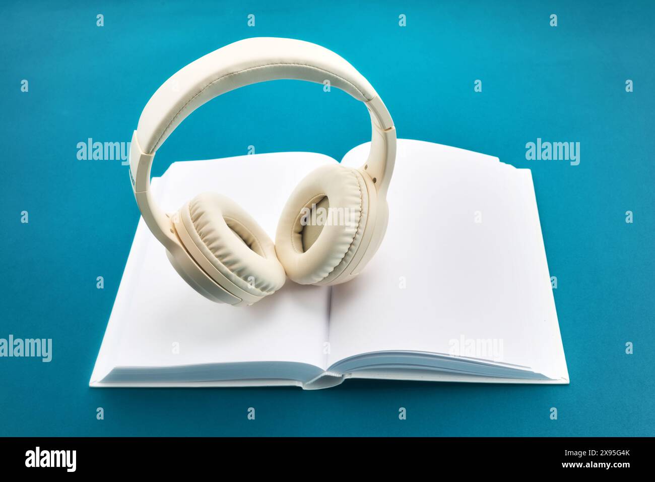 Audio book concept , white book with headphones Stock Photo - Alamy