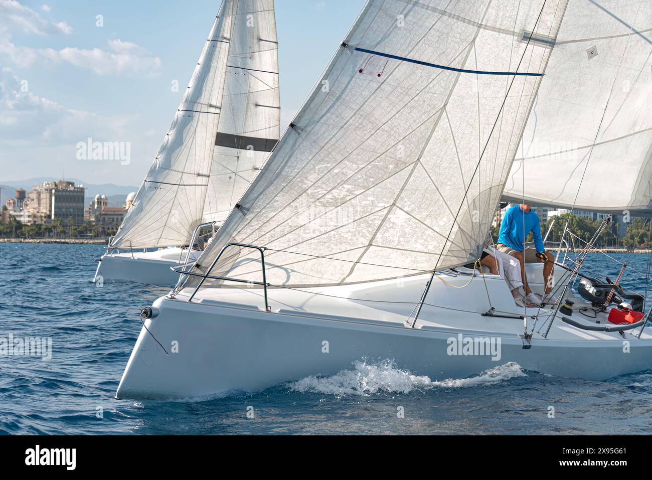 Luxurious sailing race in the mediterranean sea featuring yachts in ...