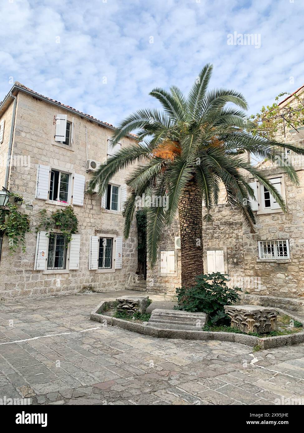 Tiny square in Budva old town, Montenegro Stock Photo - Alamy